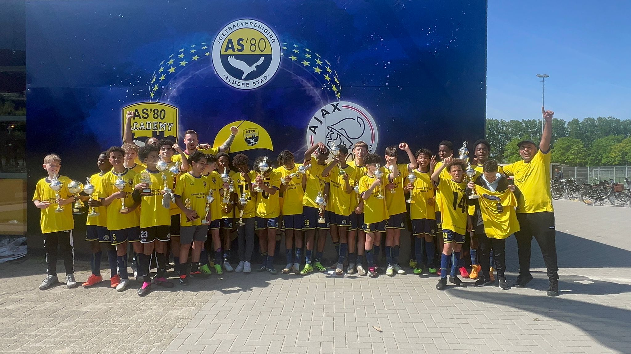 Partnering with Champions: Pfeka Celebrates AS80's Success! An Ajax FC